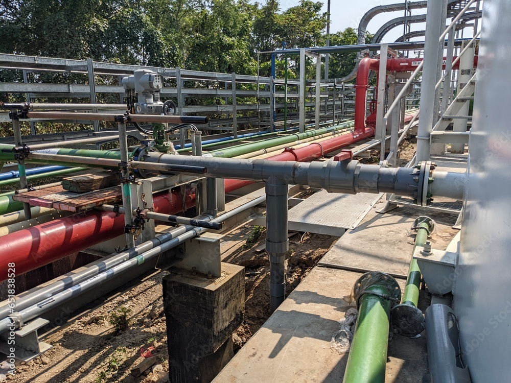 Pipe rack on the power plant industry water distribution system. The ...