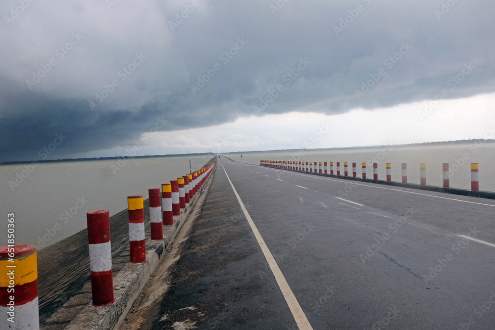 Nikli Kishoreganj is a mind-blowing road passing between water and sky ...