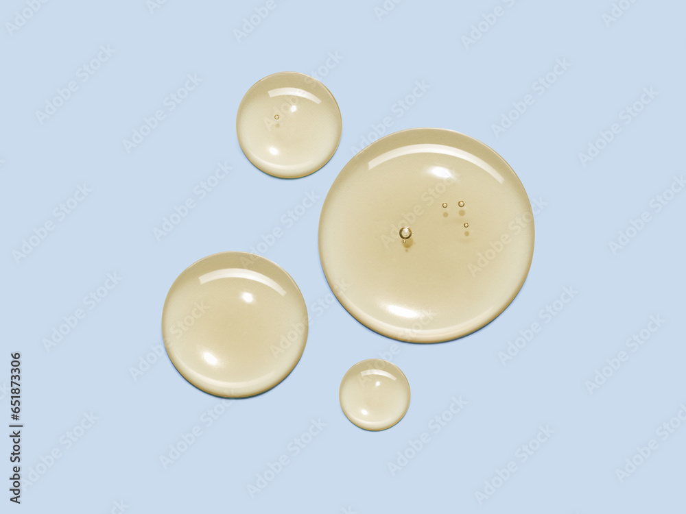 Yellow serum oil sample swatch round shape texture isolated on pastel ...
