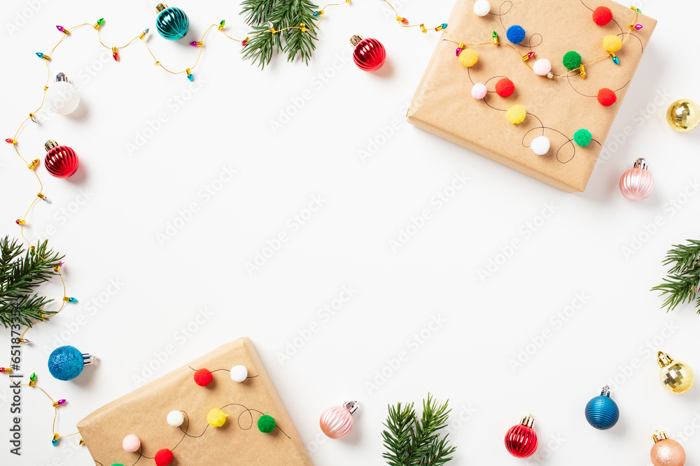 Christmas frame with handcraft gift boxes, fir branches, colorful ...