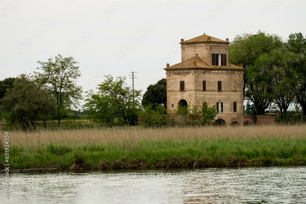 'Torre Abate', an ancient sluice with watchtower in Mesola, Italy Stock ...