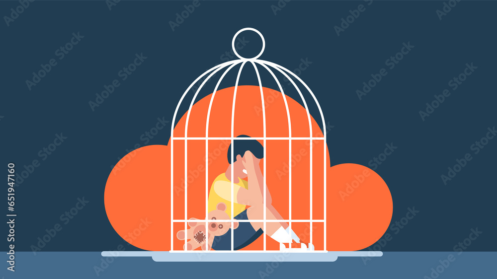 Boy sitting in a cage. A sad boy is locked up in a cage. A child is ...