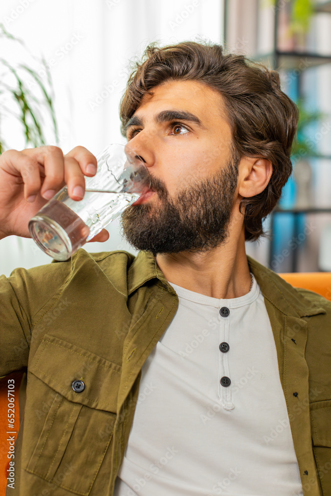 Zdjęcie Stock: Thirsty man hold glass of natural filtered aqua make ...