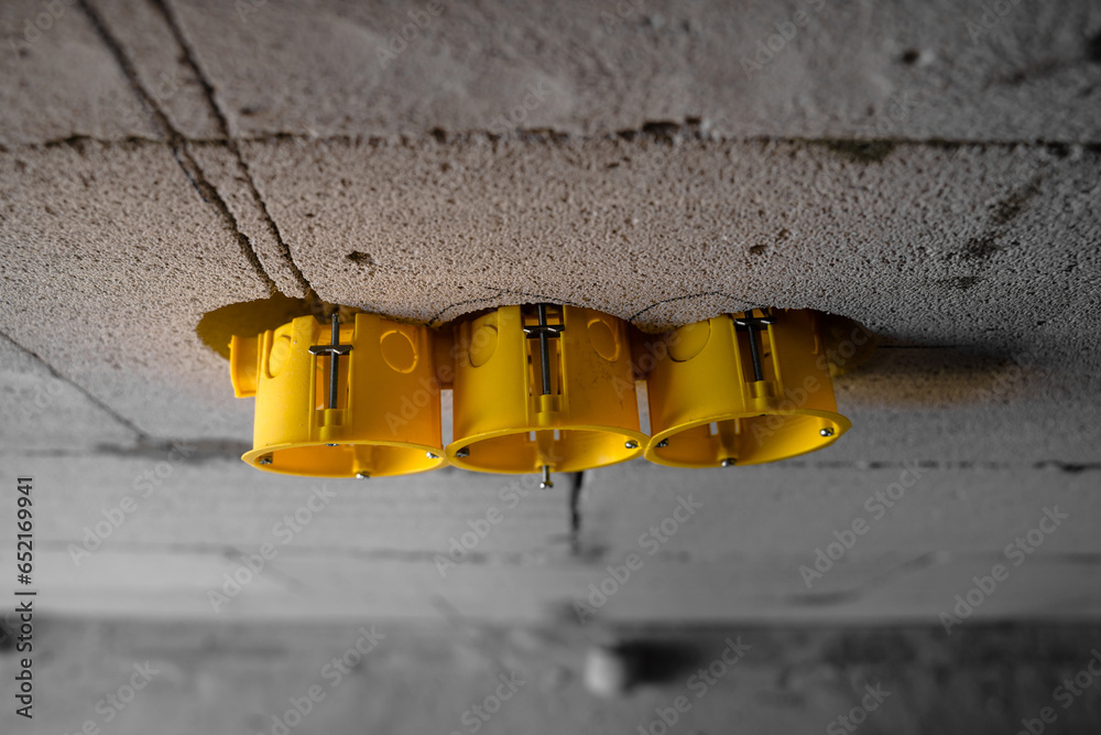 Triple yellow installation box for a socket in an aerated concrete ...