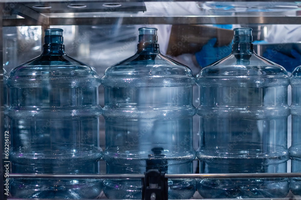 Plastic bottle for drinking water in production line of factory ...