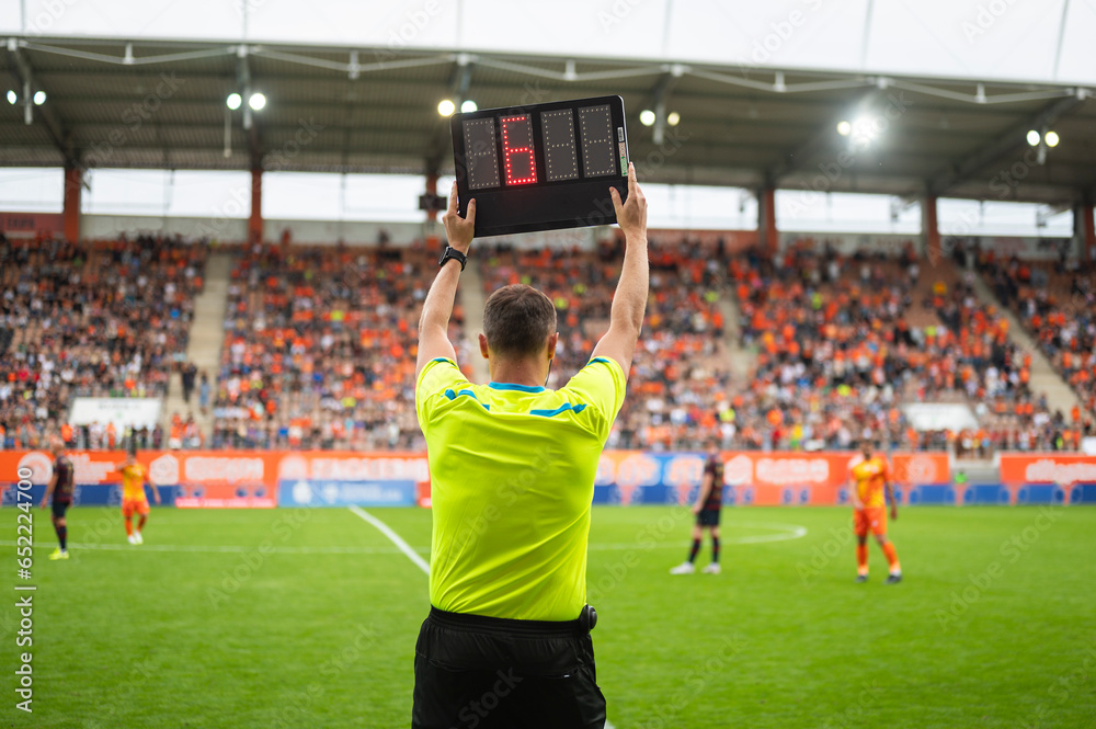 Poster Technical referee shows added time during football match. – Wall ...