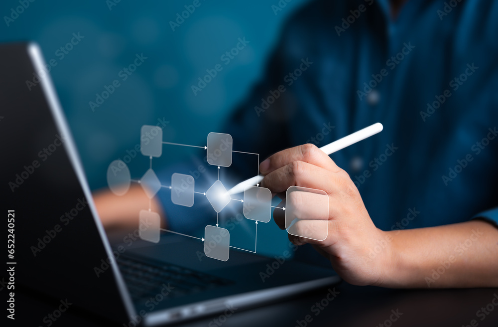 Businessman use computer to plan process workflow. Step scheme diagram ...