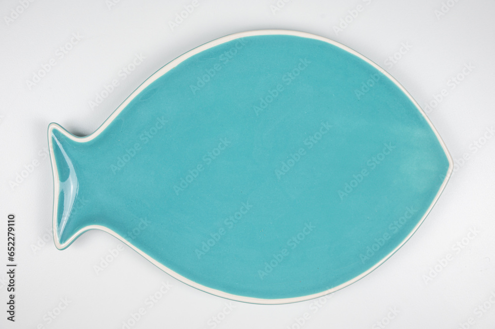 Blue fish-shaped container with white background, with space to write ...