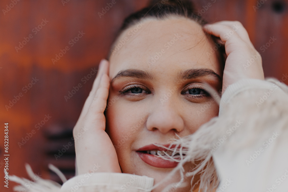 A close-up, unretouched portrait of a naturally beautiful young woman ...