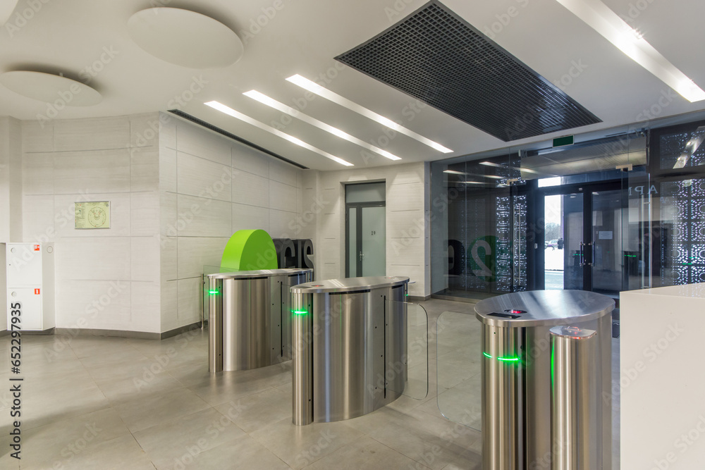 The entrance to the lobby of the office building is decorated with ...
