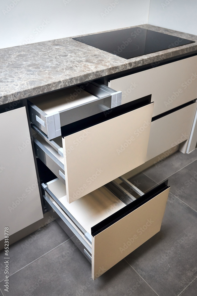 Induction cooker black glass hob or aspirating induction hob on marble ...