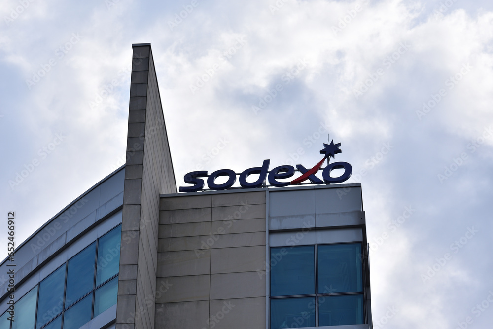 Sodexo signage, logo, emblem on the facade. French food services and ...