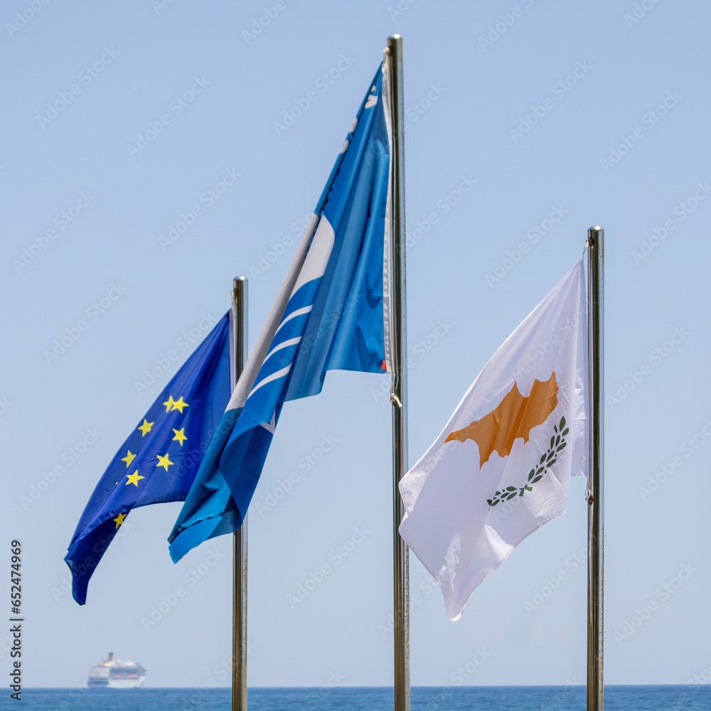 National flag of Cyprus, Blue flag and European Union flag fluttering ...