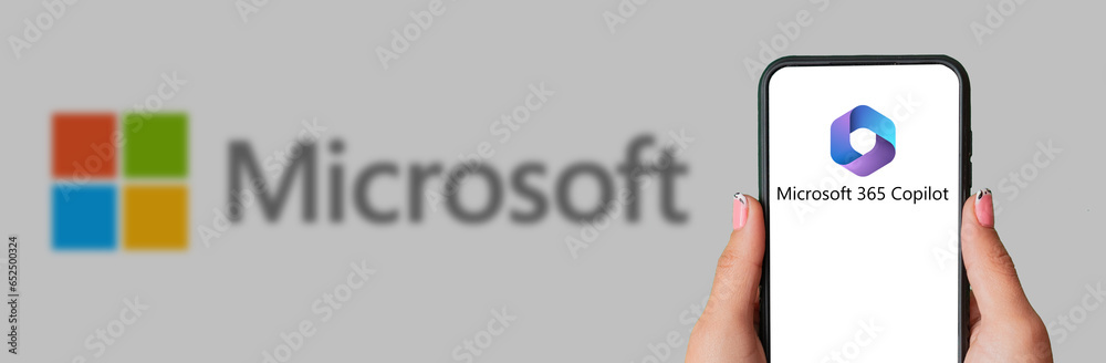 Microsoft 365 Copilot logo on smartphone screen - Horizontal banner web ...