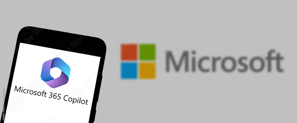 Microsoft 365 Copilot logo on smartphone screen - Horizontal banner web ...