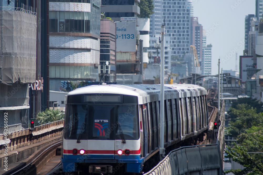 BTS Sky Train is running in downtown pass through skycrapers business ...
