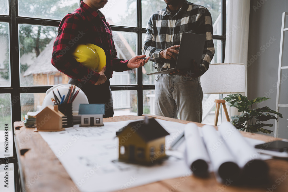 Architects and engineers work together in business, submitting ...