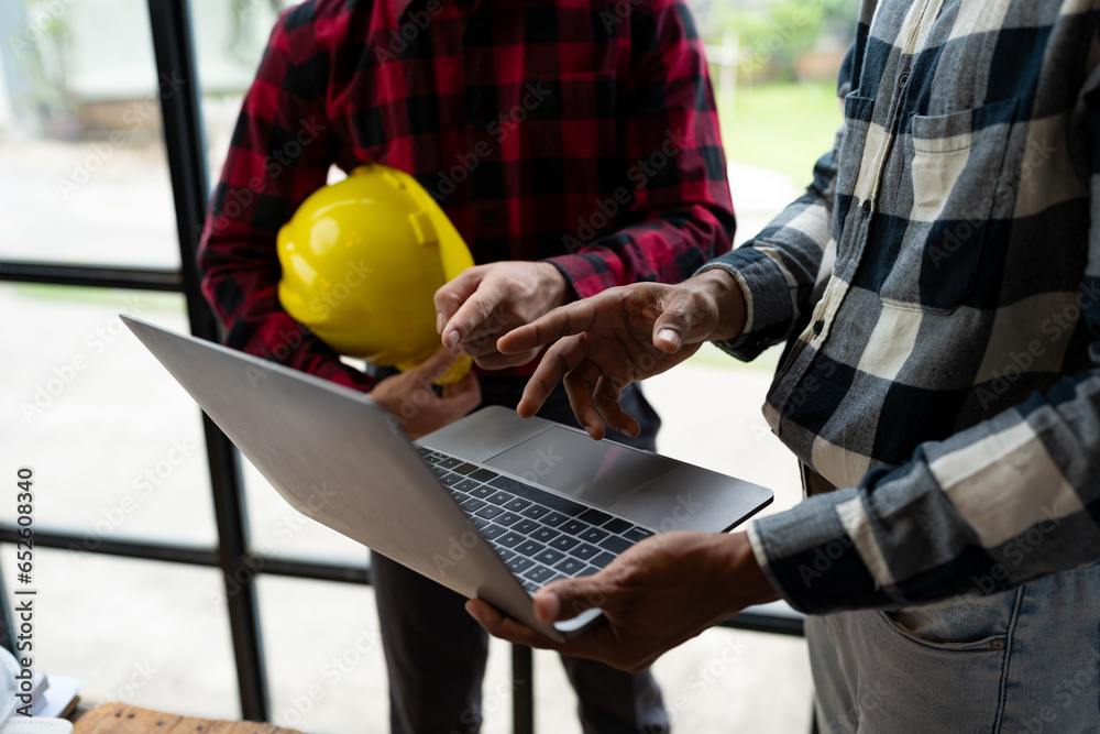 Architects and engineers work together in business, submitting ...