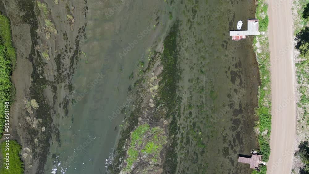 Top Down View of River with Small Islands in the Middle and Boat Docks ...