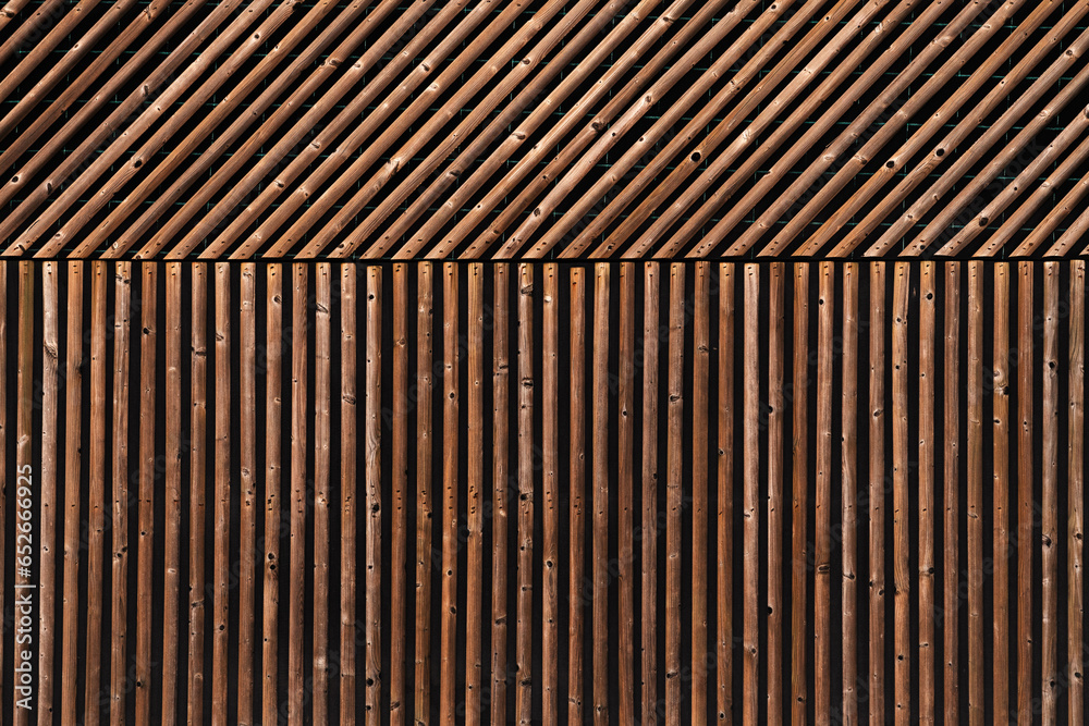 Rounded wooden slats forming modern pattern as wall design background ...
