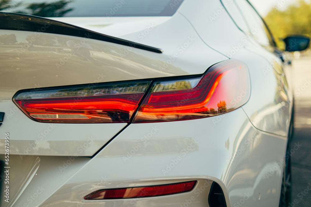 Side view of the auto.Rear headlight of the car.Outside the car.Rent a ...