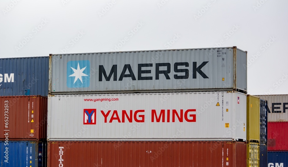 Maersk and Yang Ming containers at logistics centre Stock Photo | Adobe ...
