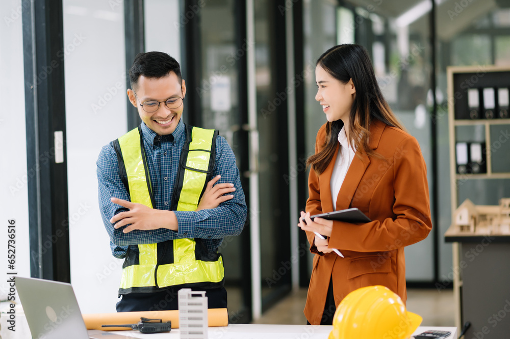 Engineer teams meeting working together wear worker helmets hardhat ...