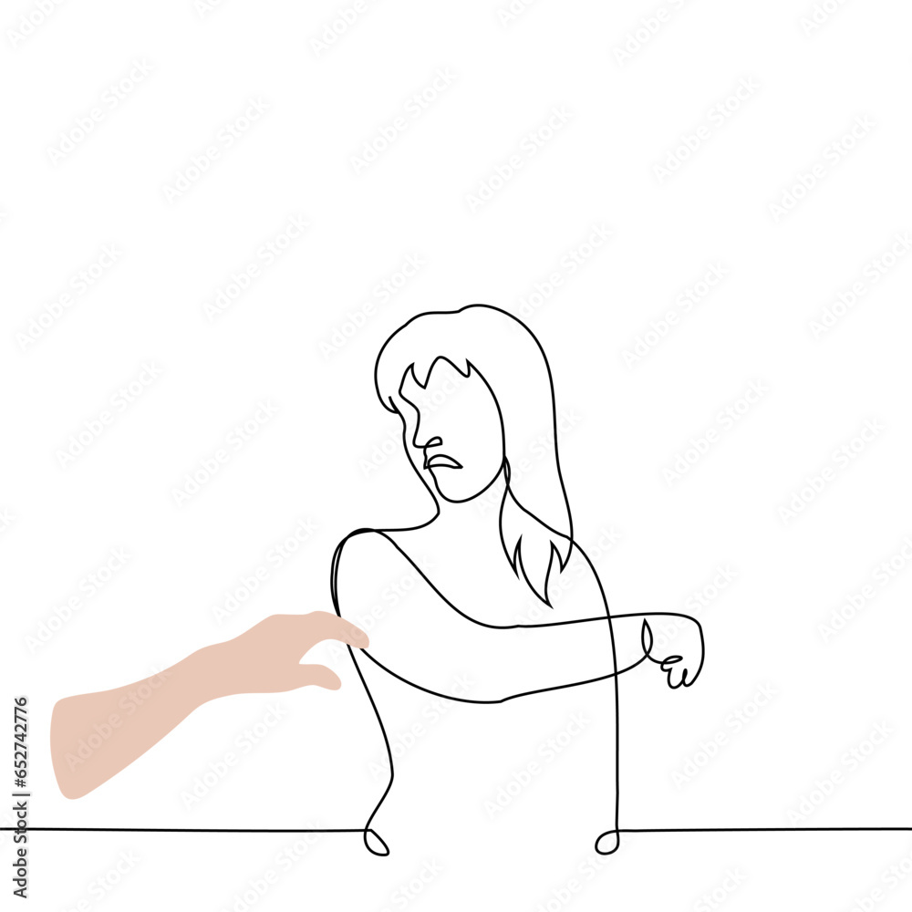 woman with irritation or disgust removes her hand from someone else's ...
