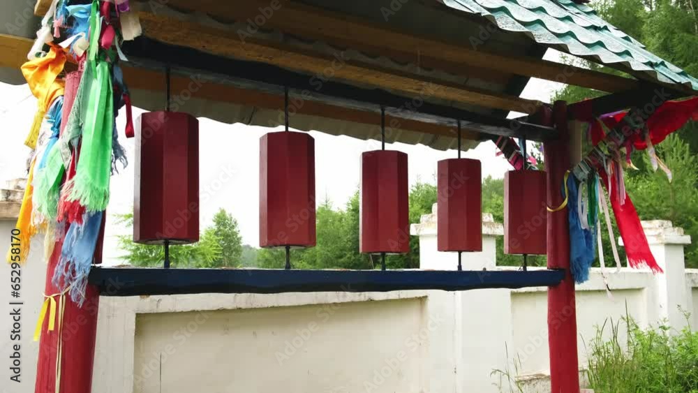 Rotating religious elements for touching turning spinning Buddhist ...