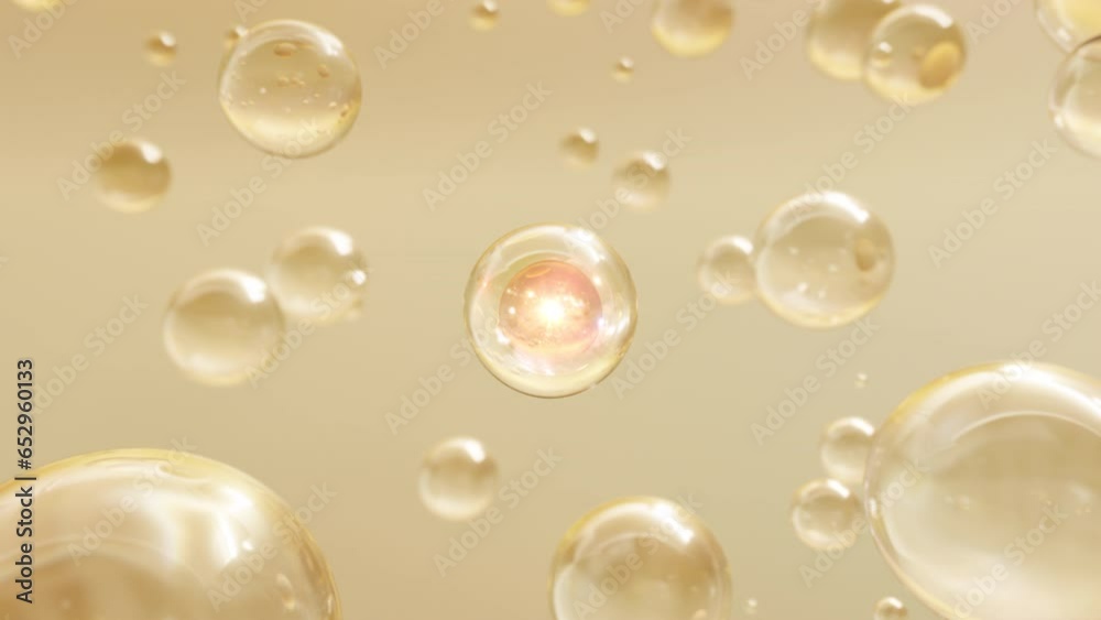 Macro shot of various Gold bubbles in water rising up on the light ...