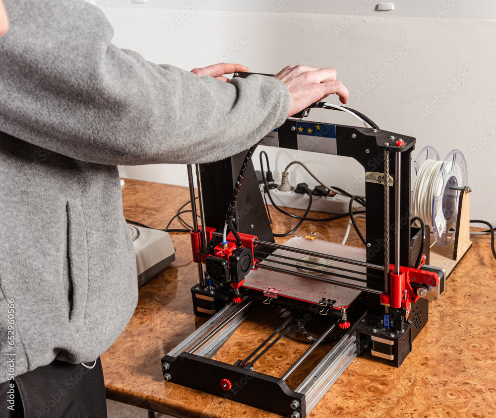 3D scanning and printing training class. Teacher shows how to work on ...