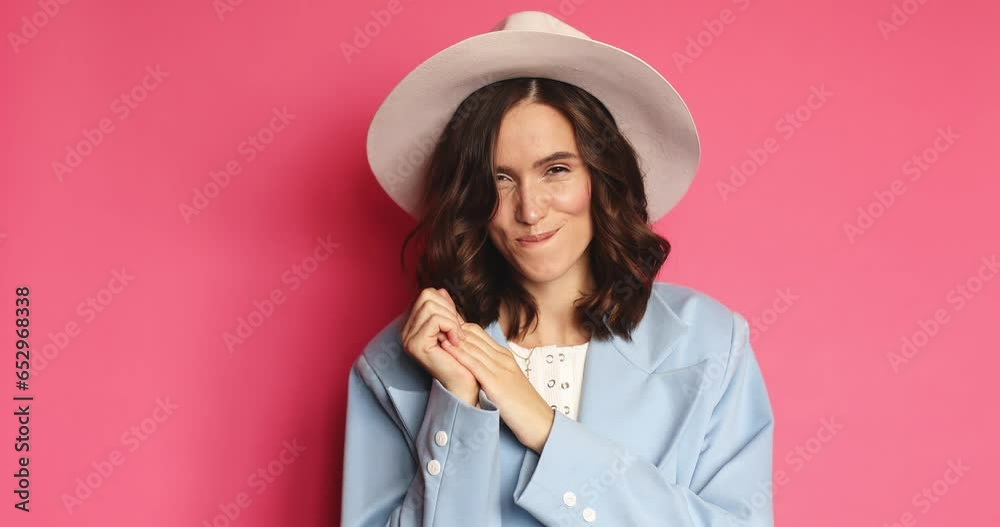 Mysterious sly woman steepls fingers and schemes something tries to ...