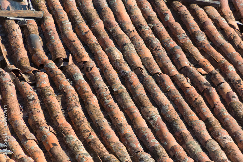 Architecture textures, detailed view of a old and damage italian orange ...