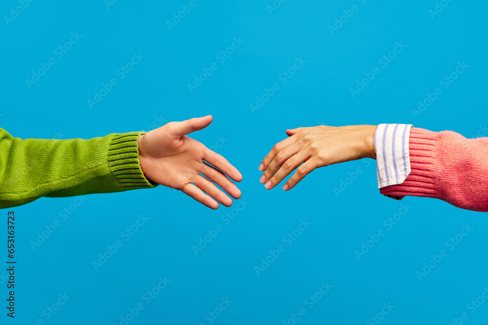 Poster. Two hands, female and male reaching out to each other for ...