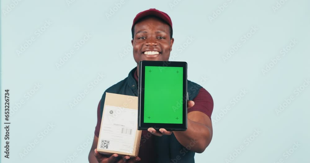 Delivery man, box and tablet in studio, green screen and face for ...