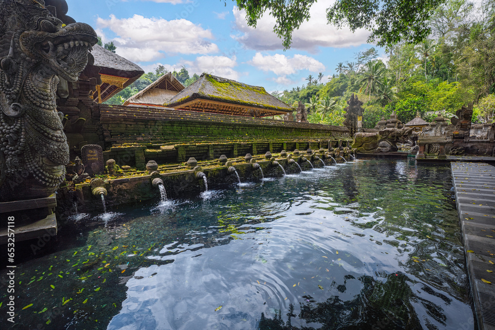 Holy spring water in temple pura Tirtha Empul inTampak, Bali, Indonesia ...