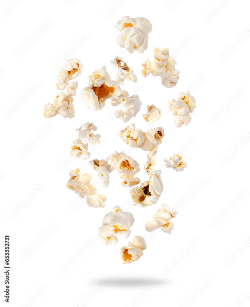 Fluffy popcorn scattered in the air closeup on a transparent background ...