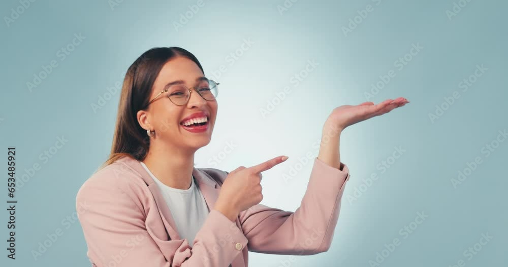 Pointing, presentation and a woman on a studio background for business ...