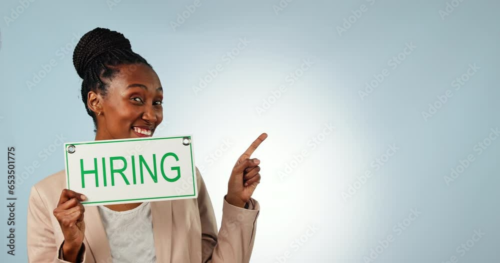 Happy black woman, hiring sign and pointing on mockup for business ...