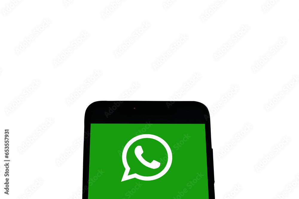 WhatsApp logo on smartphone screen with transparent or white background ...