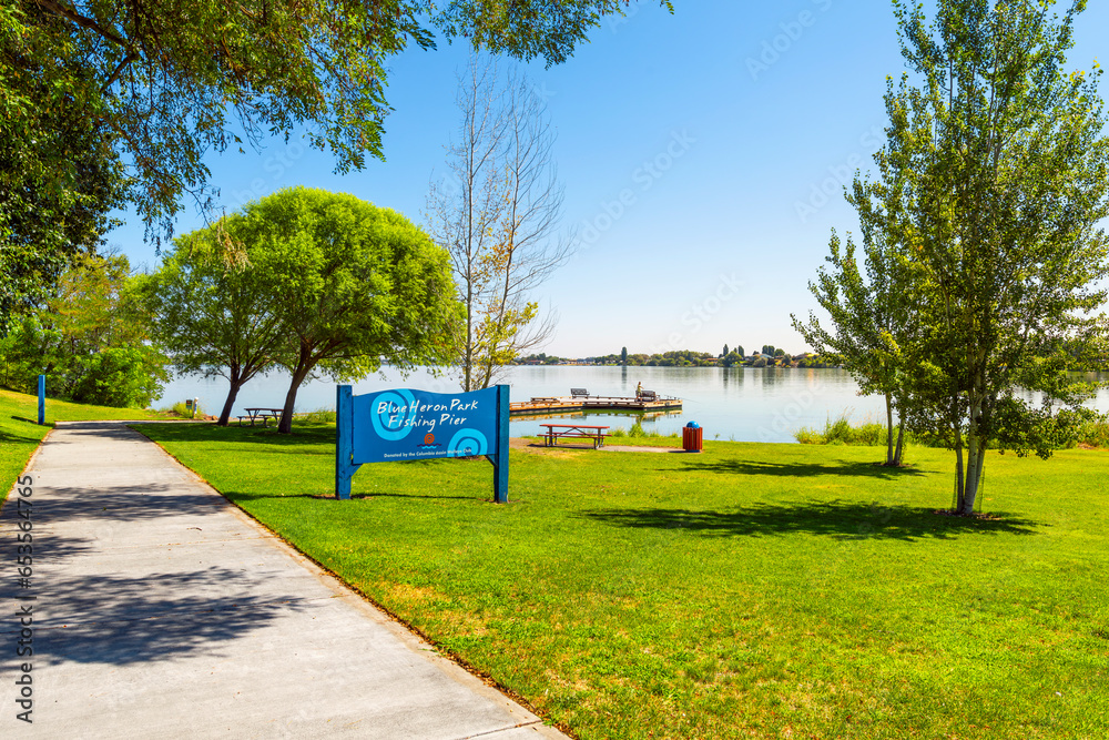 General view of the welcome sign to the The public Blue Heron Park and ...