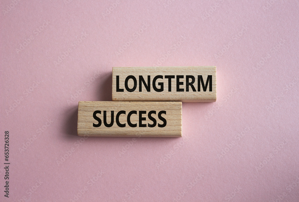 Longterm success symbol. Wooden blocks with words Longterm success ...