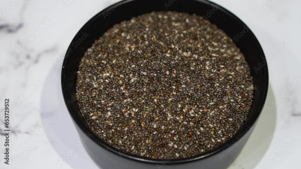 Chia Seeds in a Bowl on Marble Background. Chia seeds, a nutritional ...