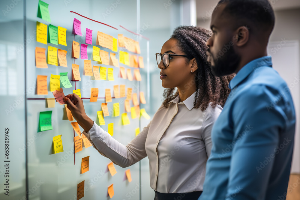 Young mixer race businesswoman manager explaining strategy ideas on ...