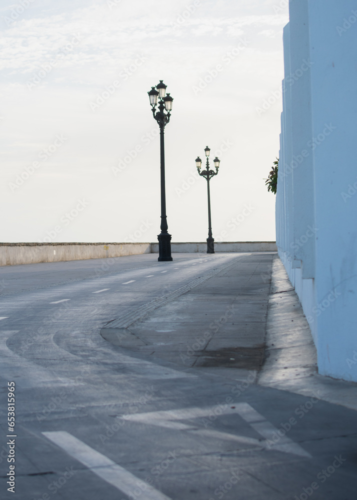 Scenic promenade featuring a dedicated bike lane, pedestrian crosswalk ...