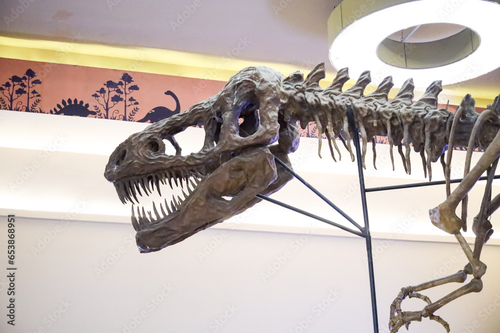 East Java, Indonesia - August 14, 2023. Fossil and Satue of a T-rex ...