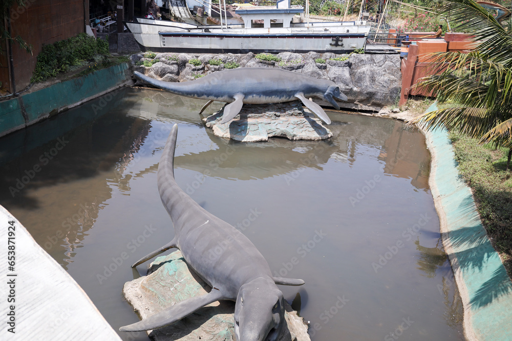 East Java, Indonesia - August 14, 2023. Fossil and Satue of a T-rex ...