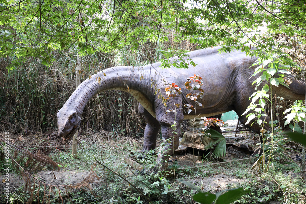 East Java, Indonesia - August 14, 2023. Fossil and Satue of a T-rex ...