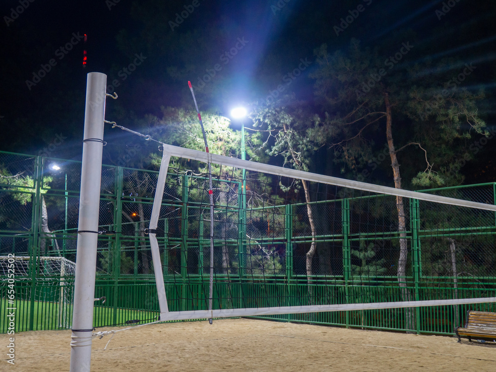 Beach volleyball court in the evening. Available infrastructure. Empty ...