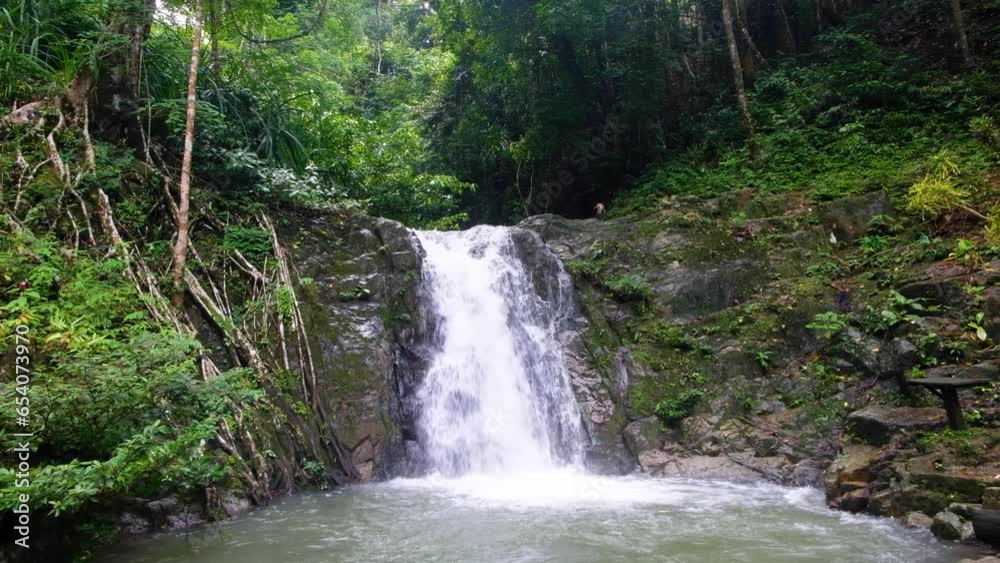 Popular Bulalacao Waterfalls with fast flowing white water into pools ...